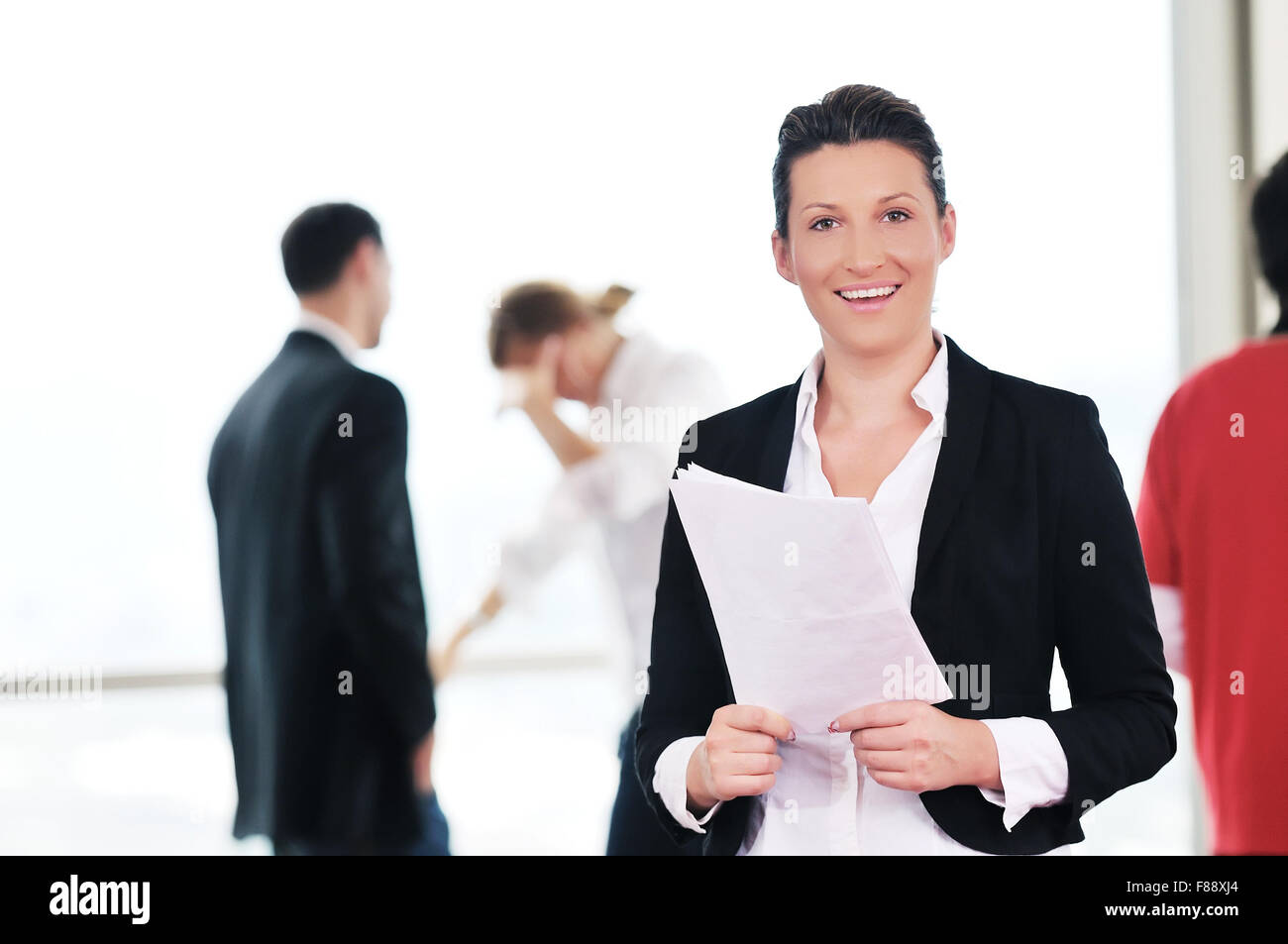 business people group together standing indoor and representing team ...