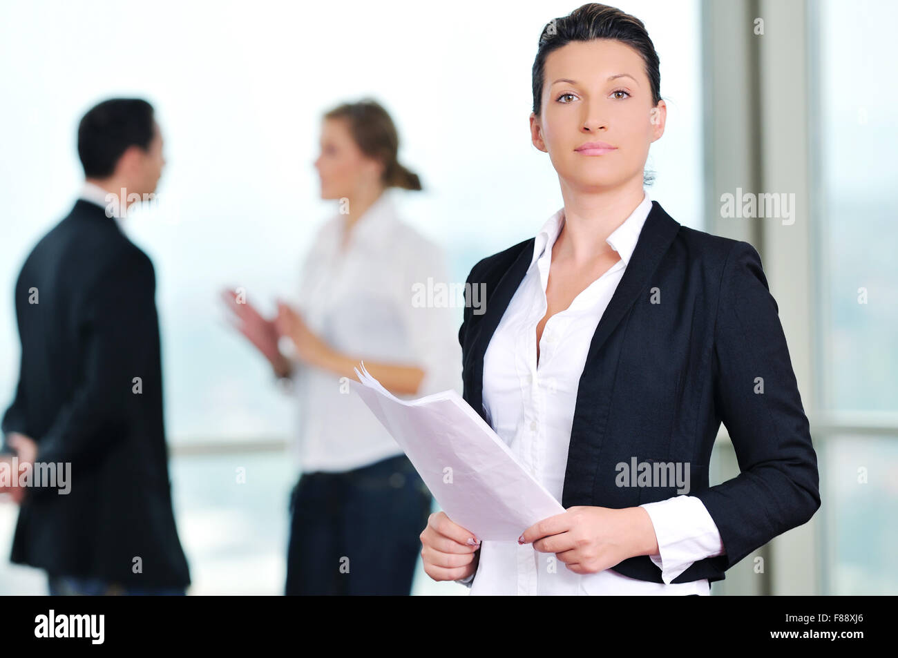 business people group together standing indoor and representing team ...