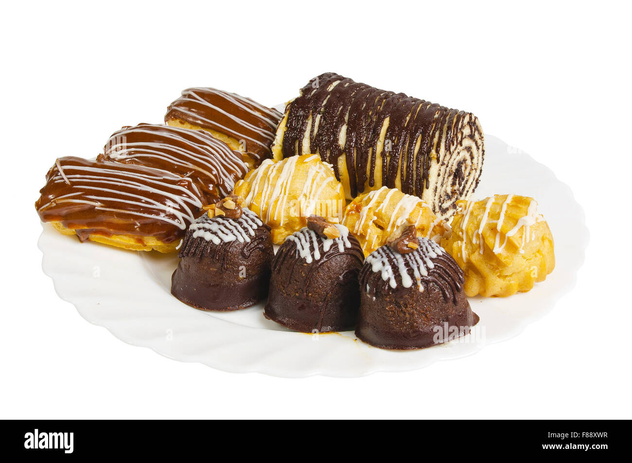 Delicious biscuit cake on the plate isolated on white background Stock ...