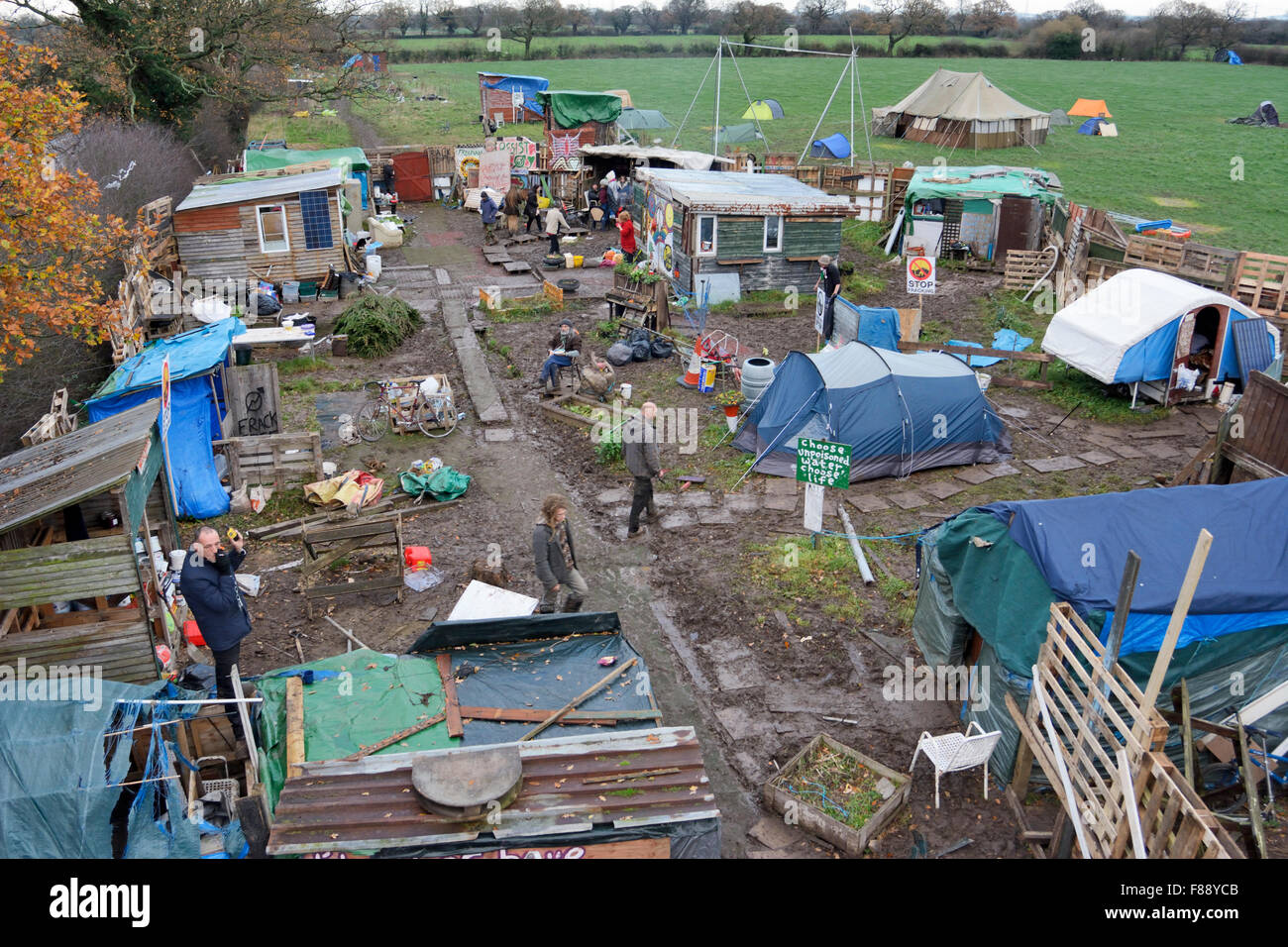 Upton, Chester, UK. 7th December 2015. Camp members working and ...