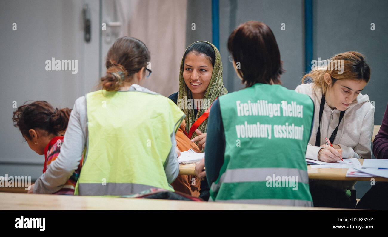Dresden, Germany. 07th Dec, 2015. Refugees receive German lessons from ...