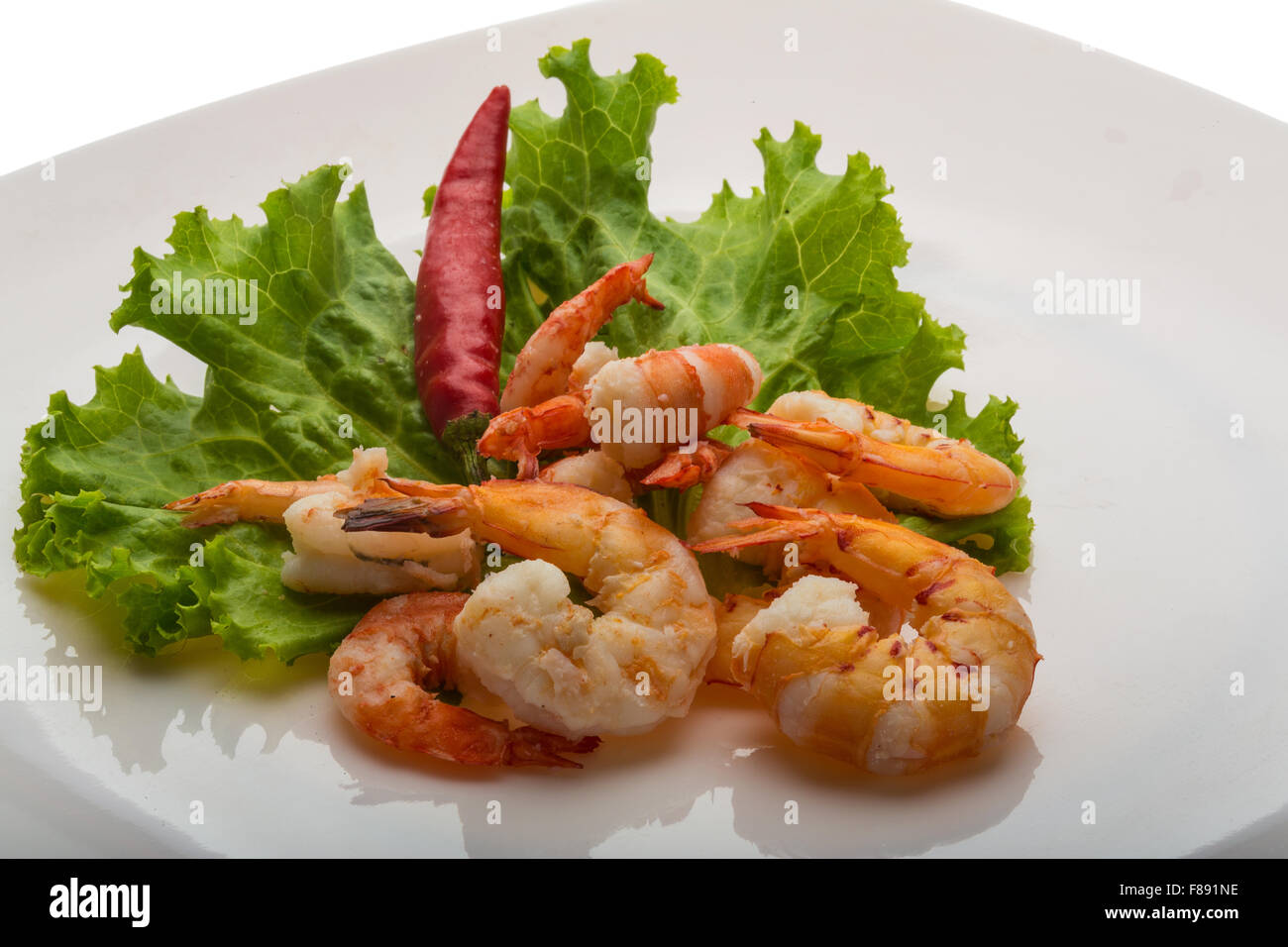 Unshelled king prawn heap with salad leaves Stock Photo - Alamy