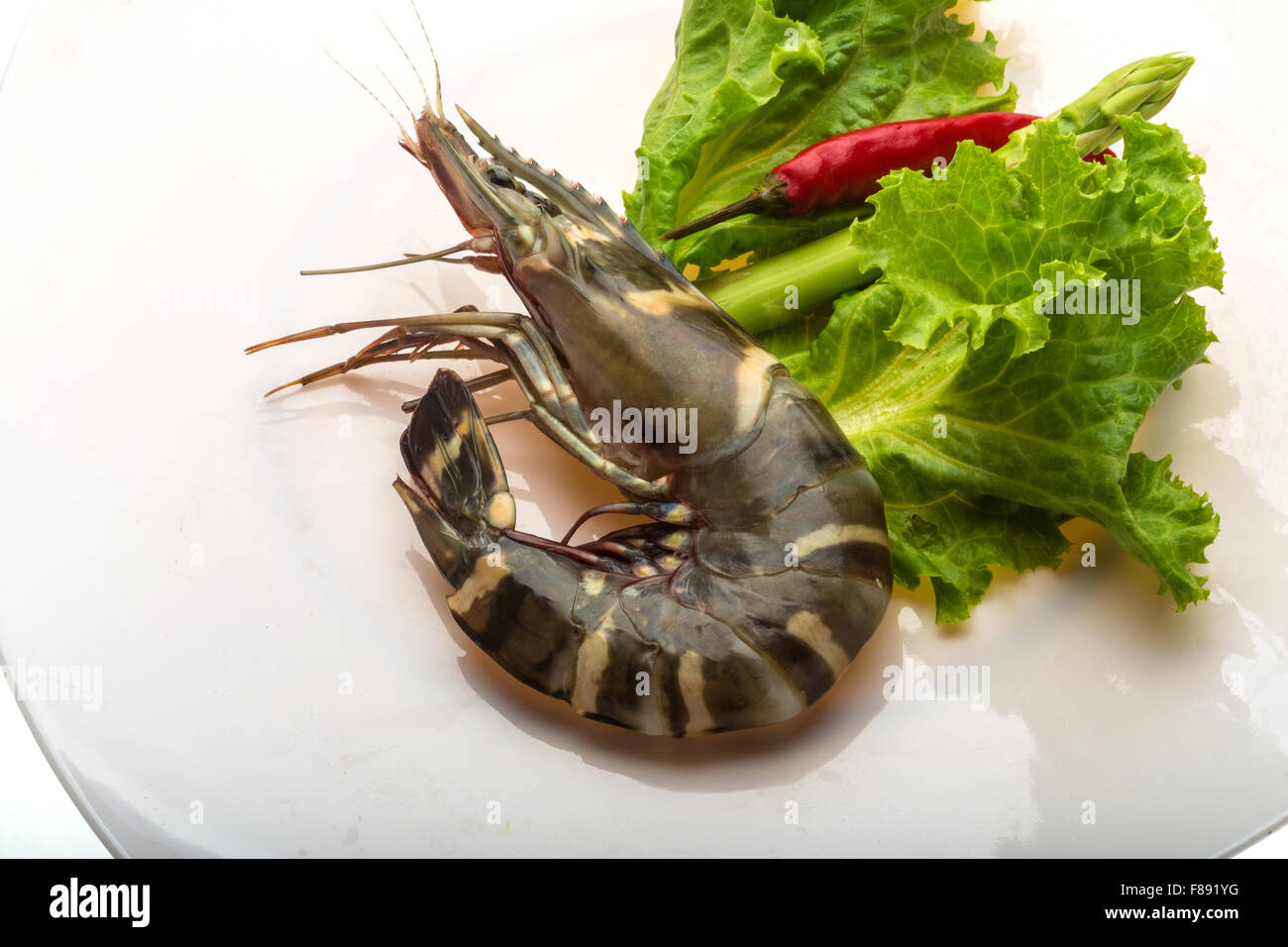 Raw Tiger prawn ready for cooking Stock Photo - Alamy