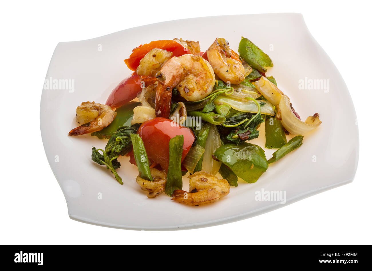 Seafood with vegetables - shrimps and calamari Stock Photo - Alamy