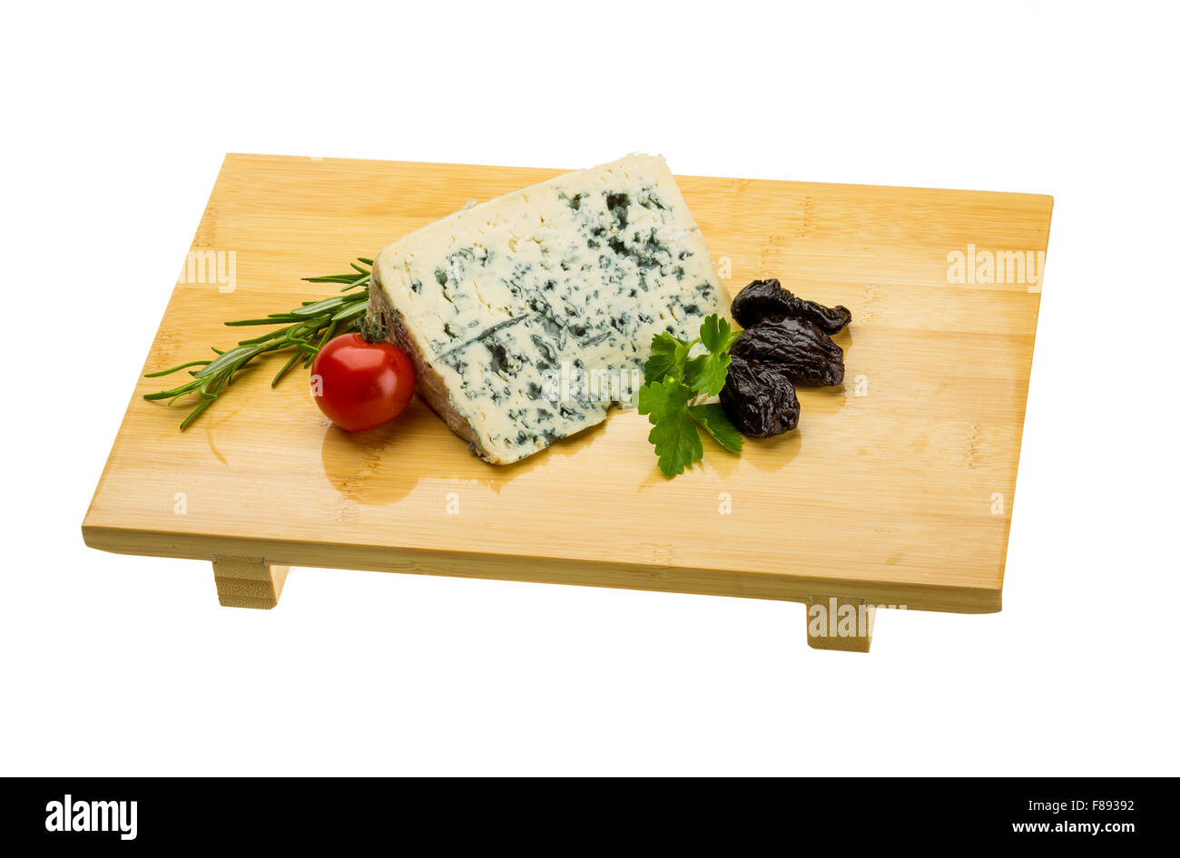 Blue cheese on the desk Stock Photo - Alamy