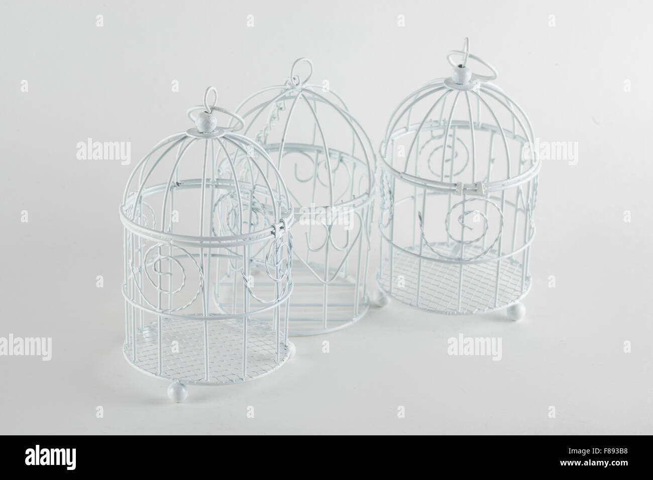 Decorative white cages Stock Photo - Alamy