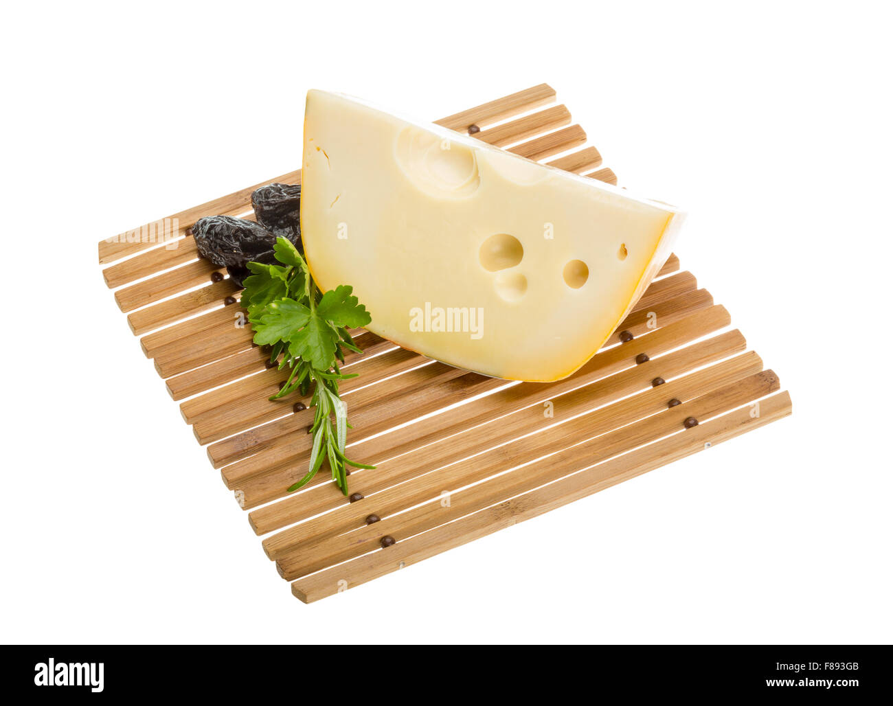 Maasdam cheese with thyme and tomato Stock Photo - Alamy