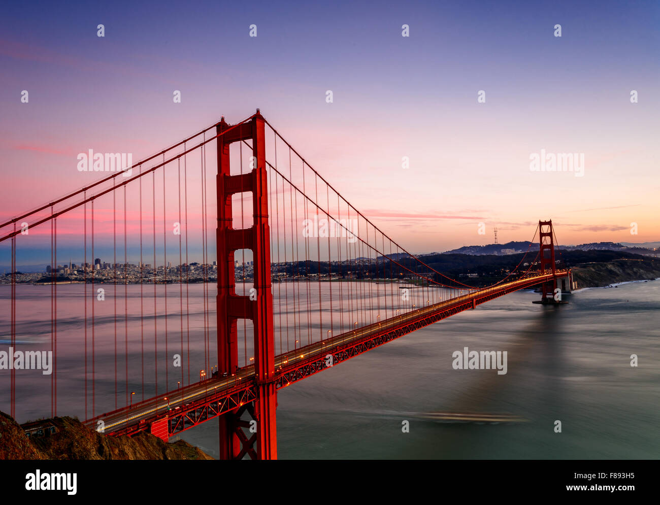 Colorful sunset over the Golden Gate Bridge and the San Francisco ...