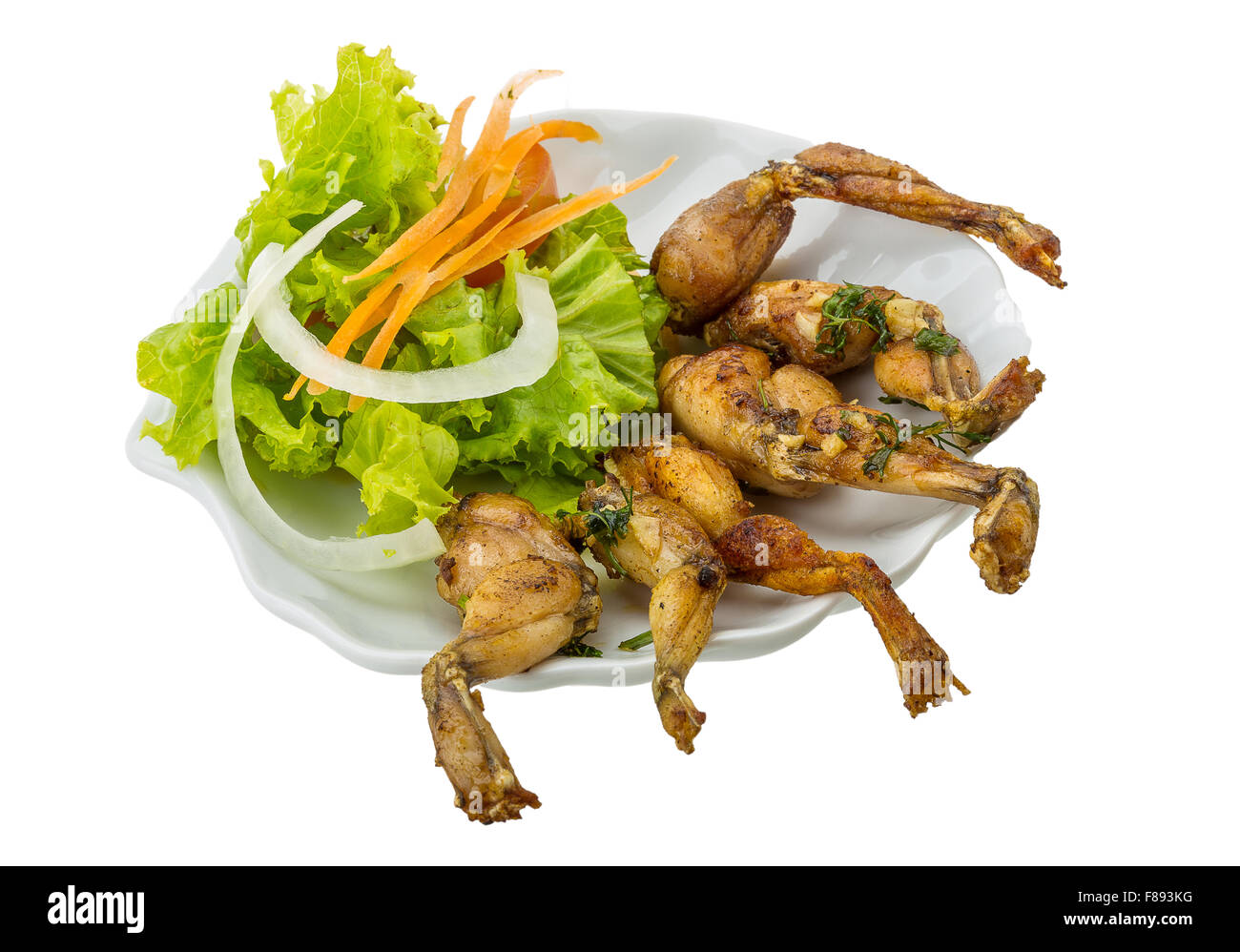 Grilled frog legs - French style Stock Photo - Alamy