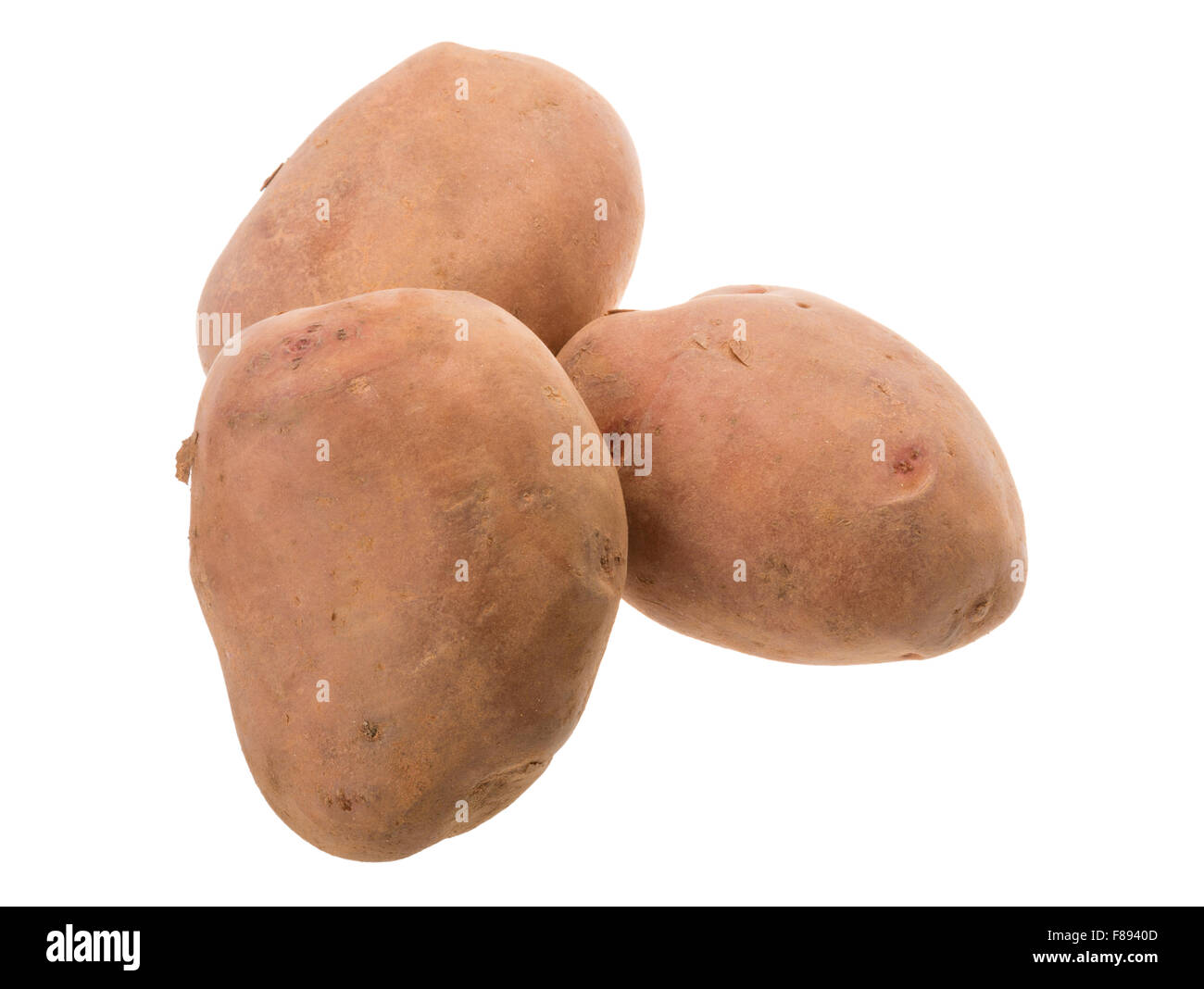 Heap of raw potato isolated Stock Photo - Alamy