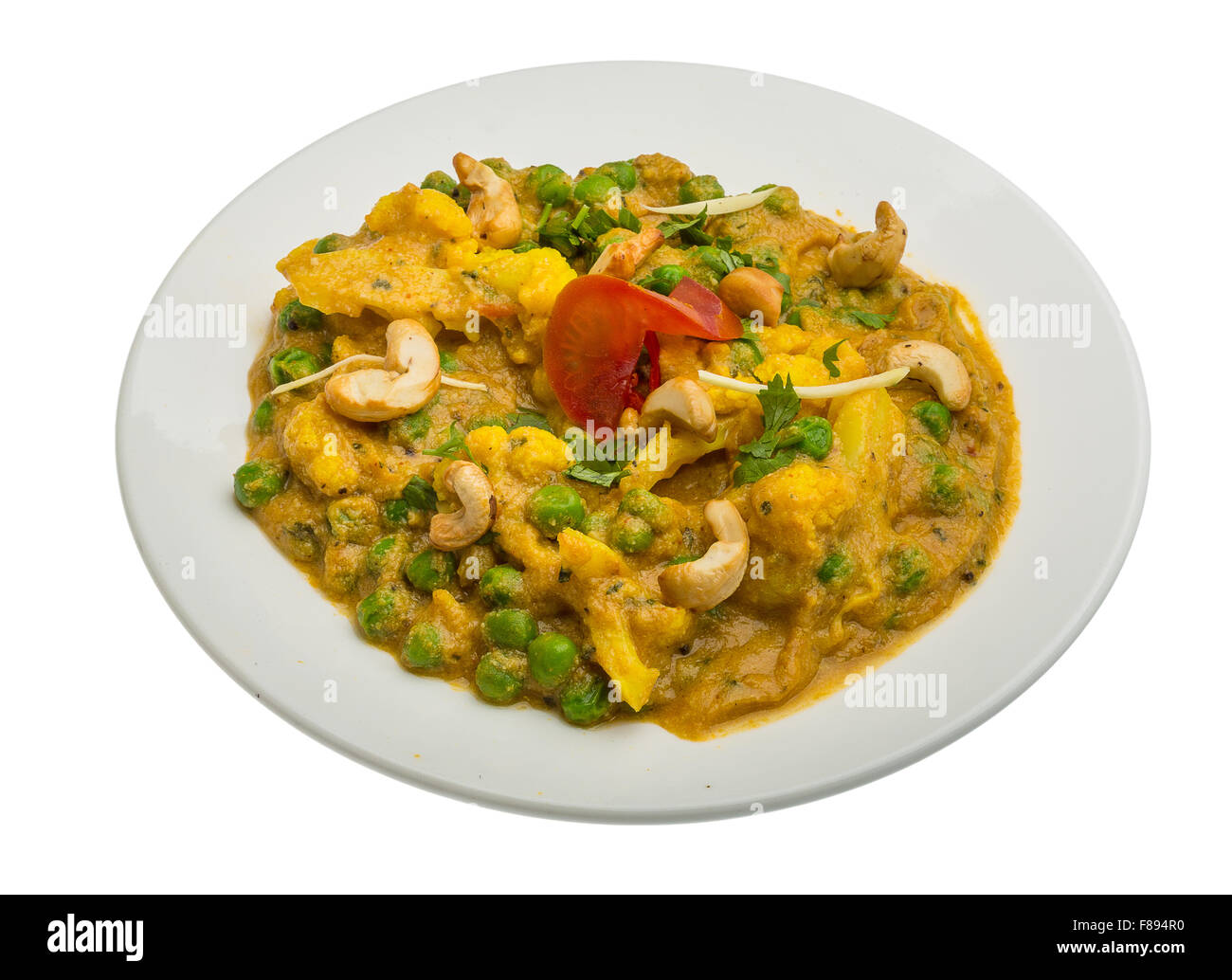 Gobi Mutter Kaju - cauliflower with green peas and cashew Stock Photo ...