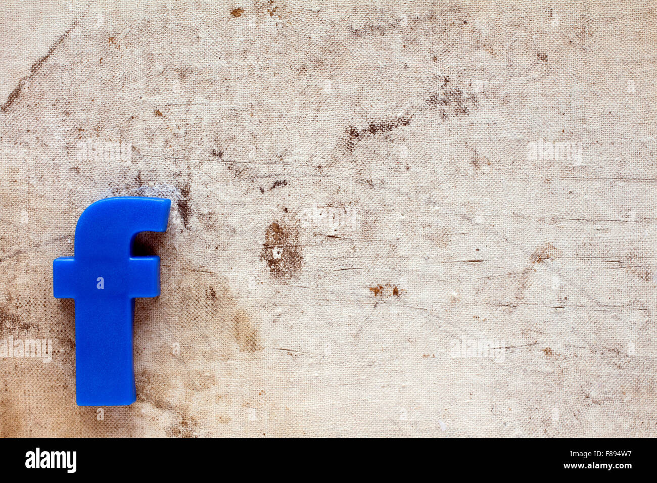 Blue plastic letter F on canvas background with copy-space Stock Photo ...