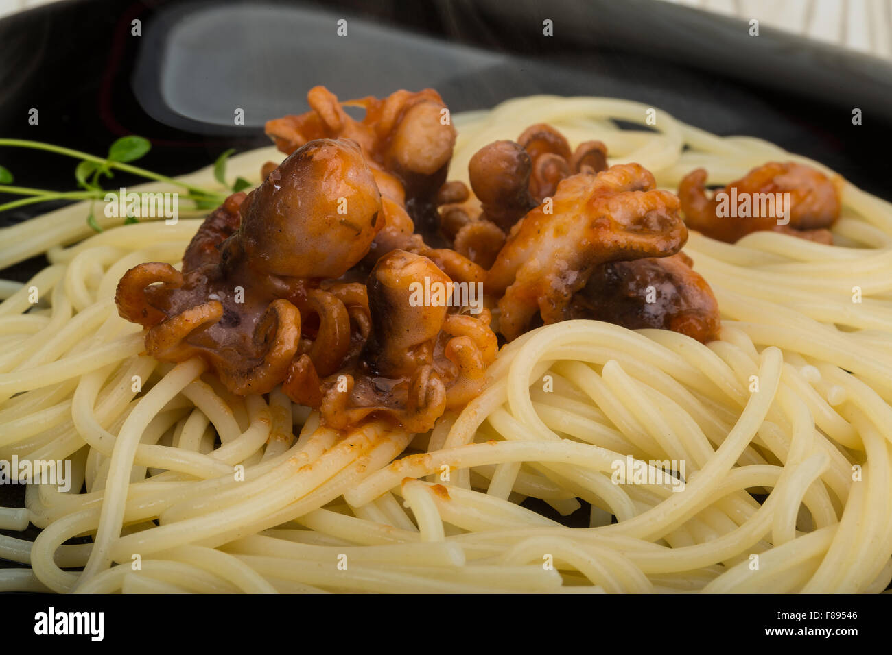 Pasta with octopus - italian spaghetti marinara Stock Photo - Alamy