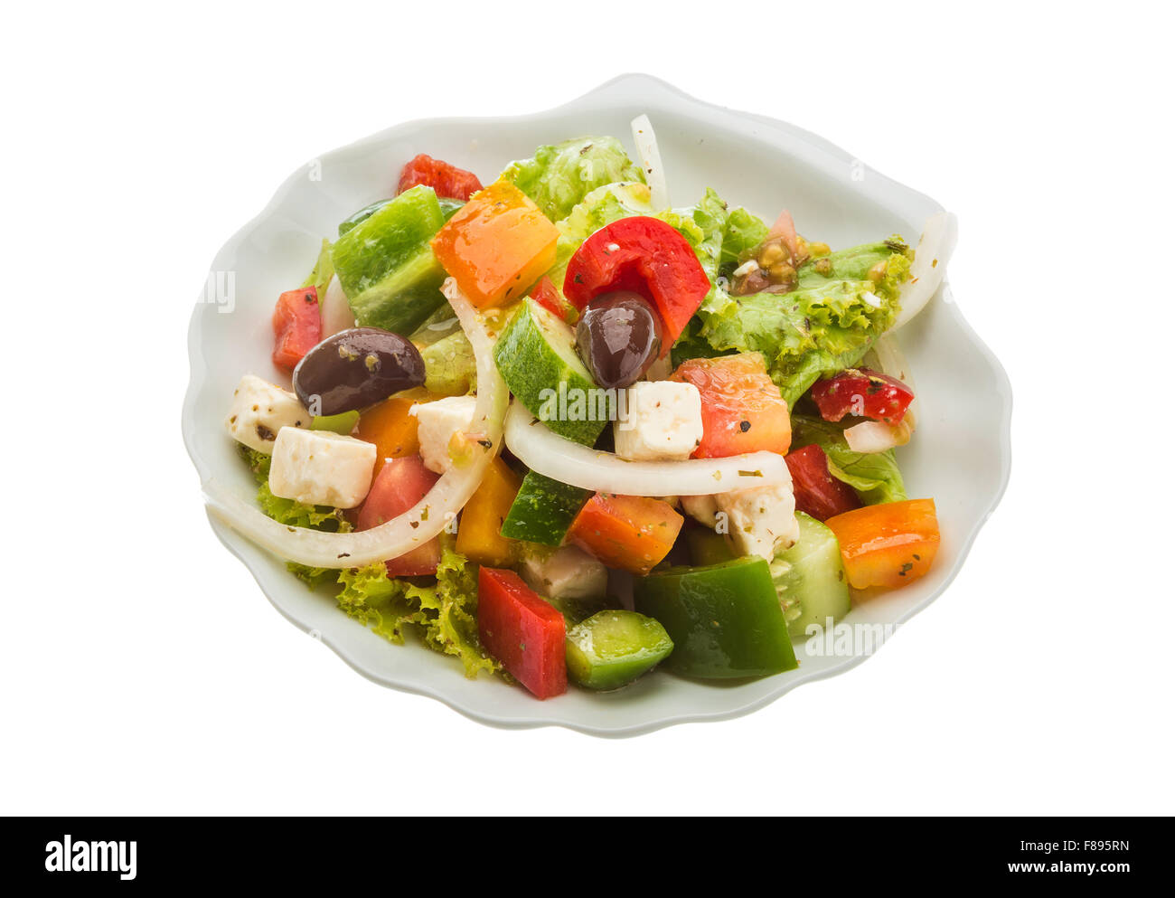 Delicous greek salad isolated on white Stock Photo - Alamy