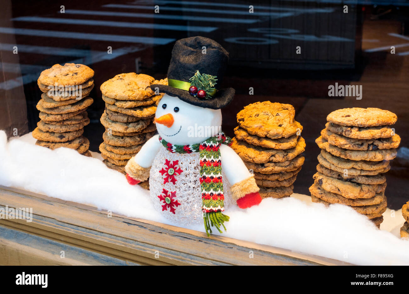 A Christmas snowman in the window of a bakery Stock Photo - Alamy