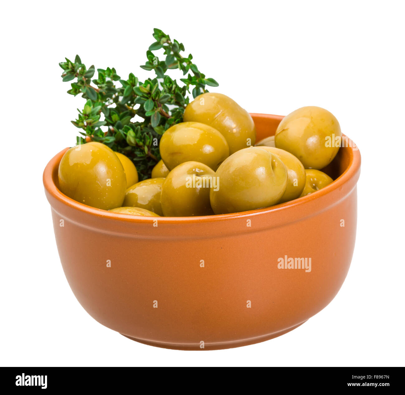 Green gigant olives with thyme Stock Photo - Alamy