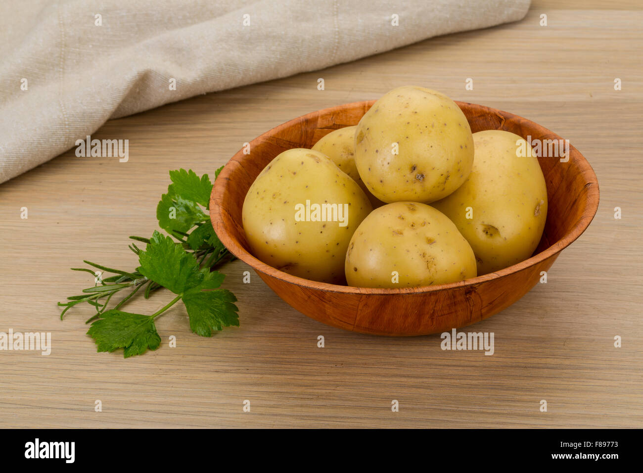 New season Raw potatoes on the desk Stock Photo - Alamy
