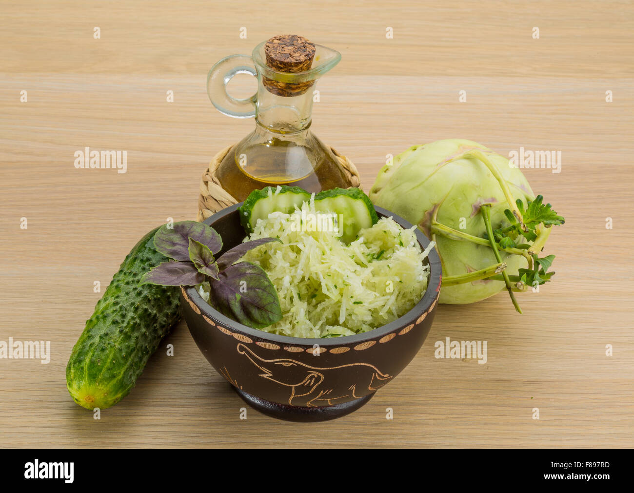 Kohlrabi and cucumber salad with basil Stock Photo - Alamy