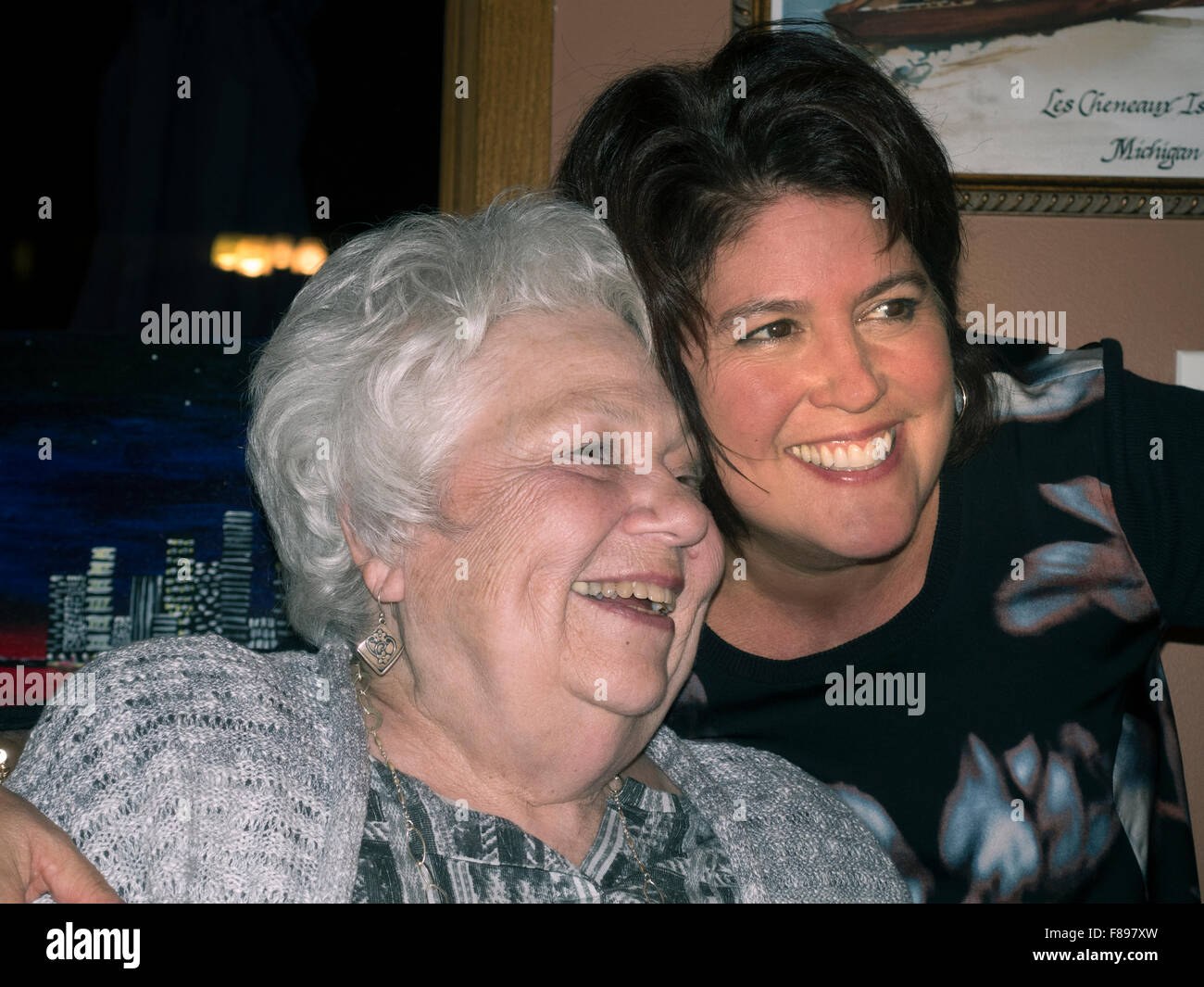 Mom and daughter age 79 and 52 smiling and laughing together. Downers ...