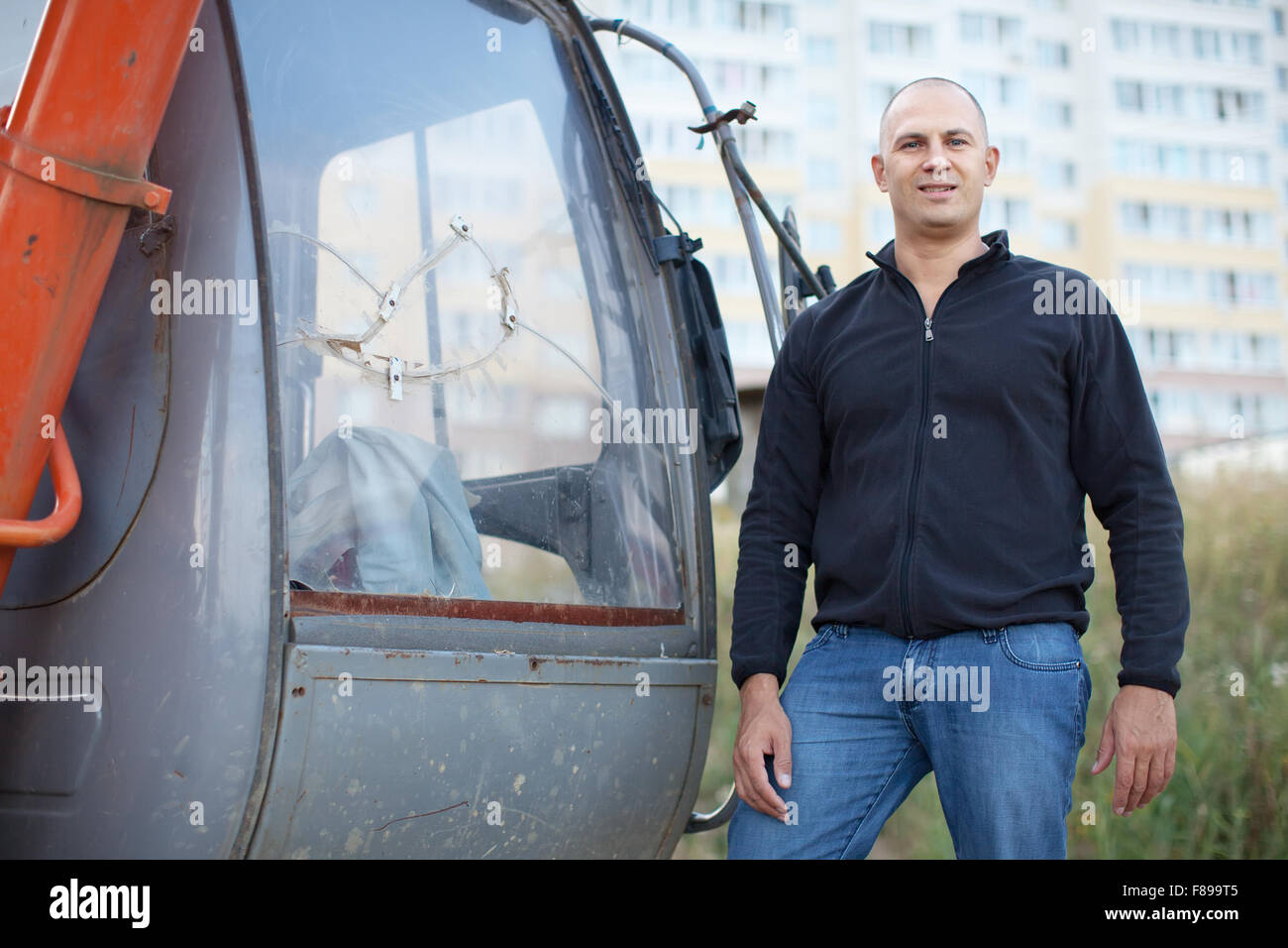 Portrait of tractor operator at construction site Stock Photo - Alamy