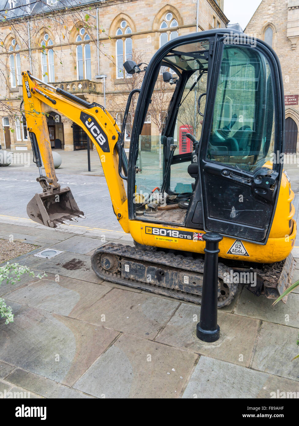 JCB 8018 Mini Digger Excavator in a town centre Stock Photo - Alamy