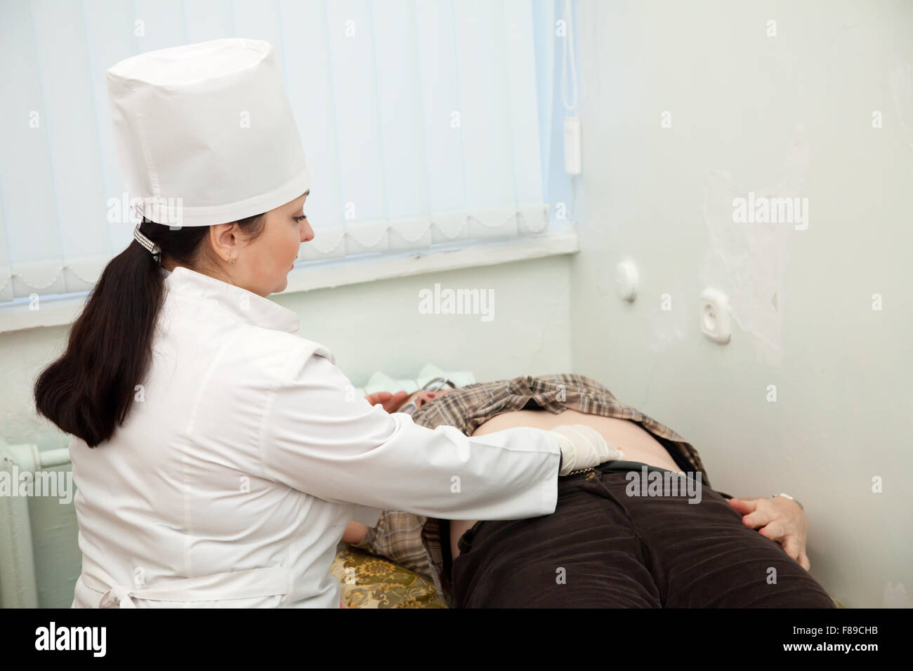 Patient lying on stomach hi-res stock photography and images - Alamy