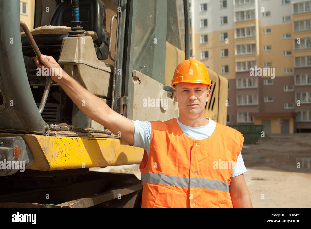 Portrait of tractor operator at construction site Stock Photo - Alamy