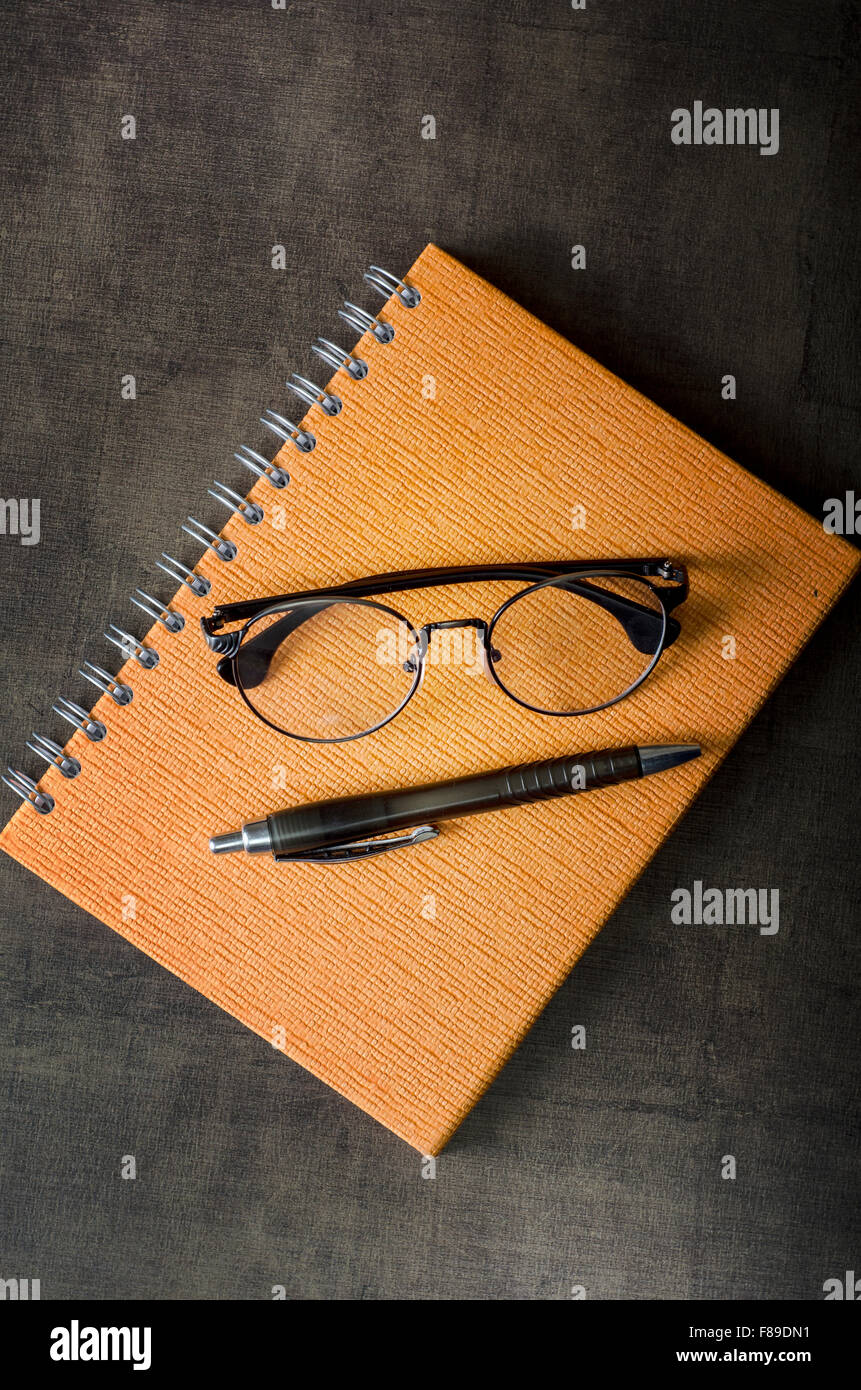 Office supplies and glasses. View from above Stock Photo - Alamy