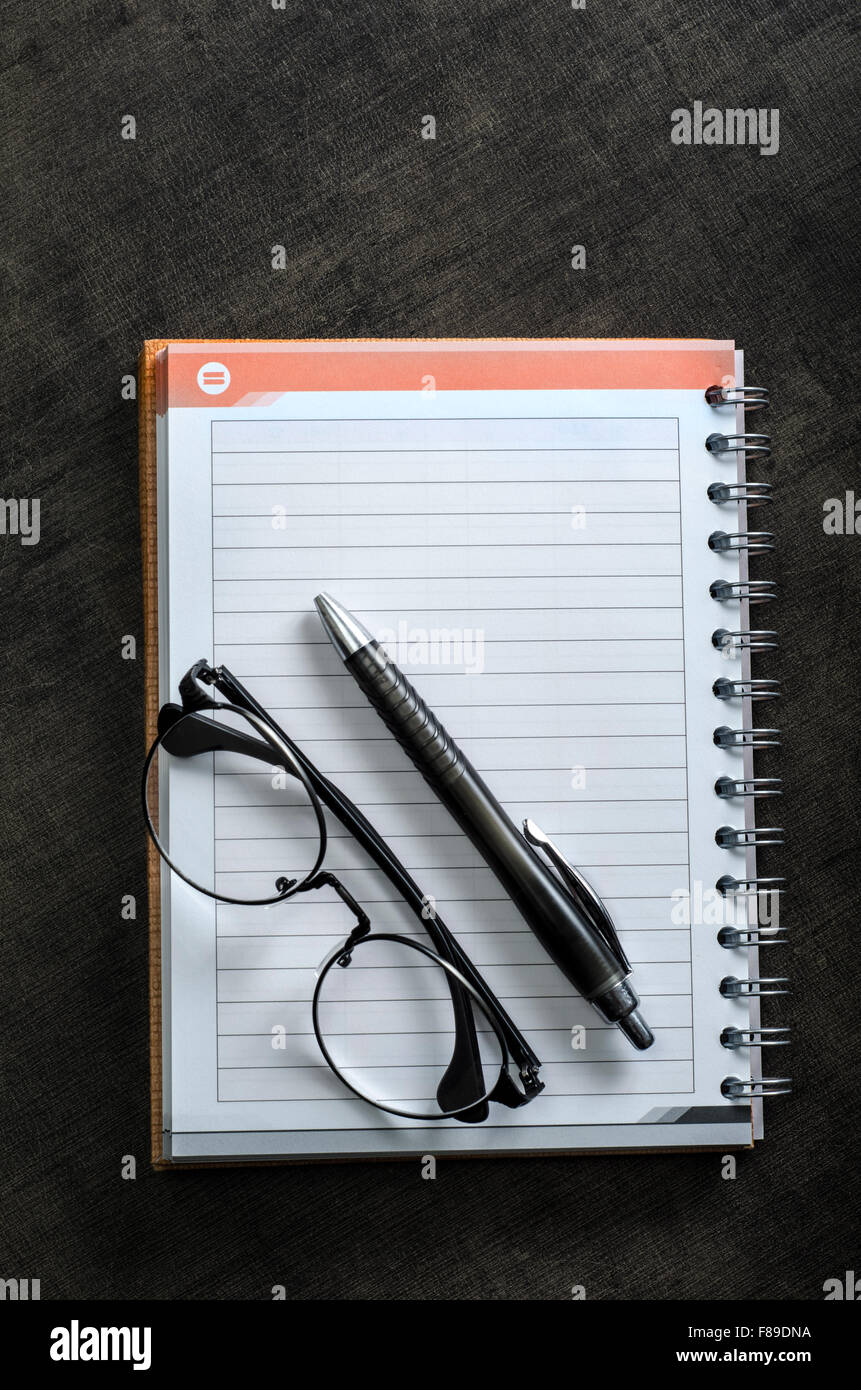 Office supplies and glasses. View from above Stock Photo - Alamy