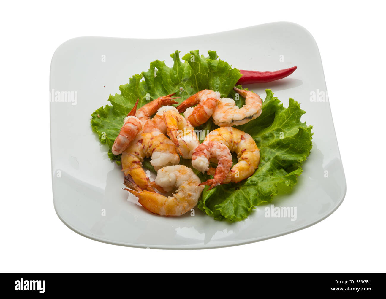 Unshelled king prawn heap with salad leaves Stock Photo - Alamy