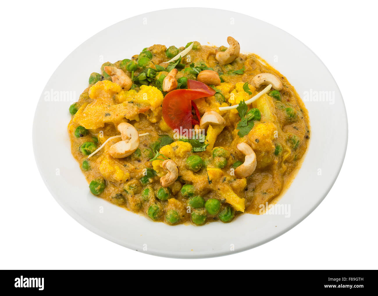 Gobi Mutter Kaju - cauliflower with green peas and cashew Stock Photo ...