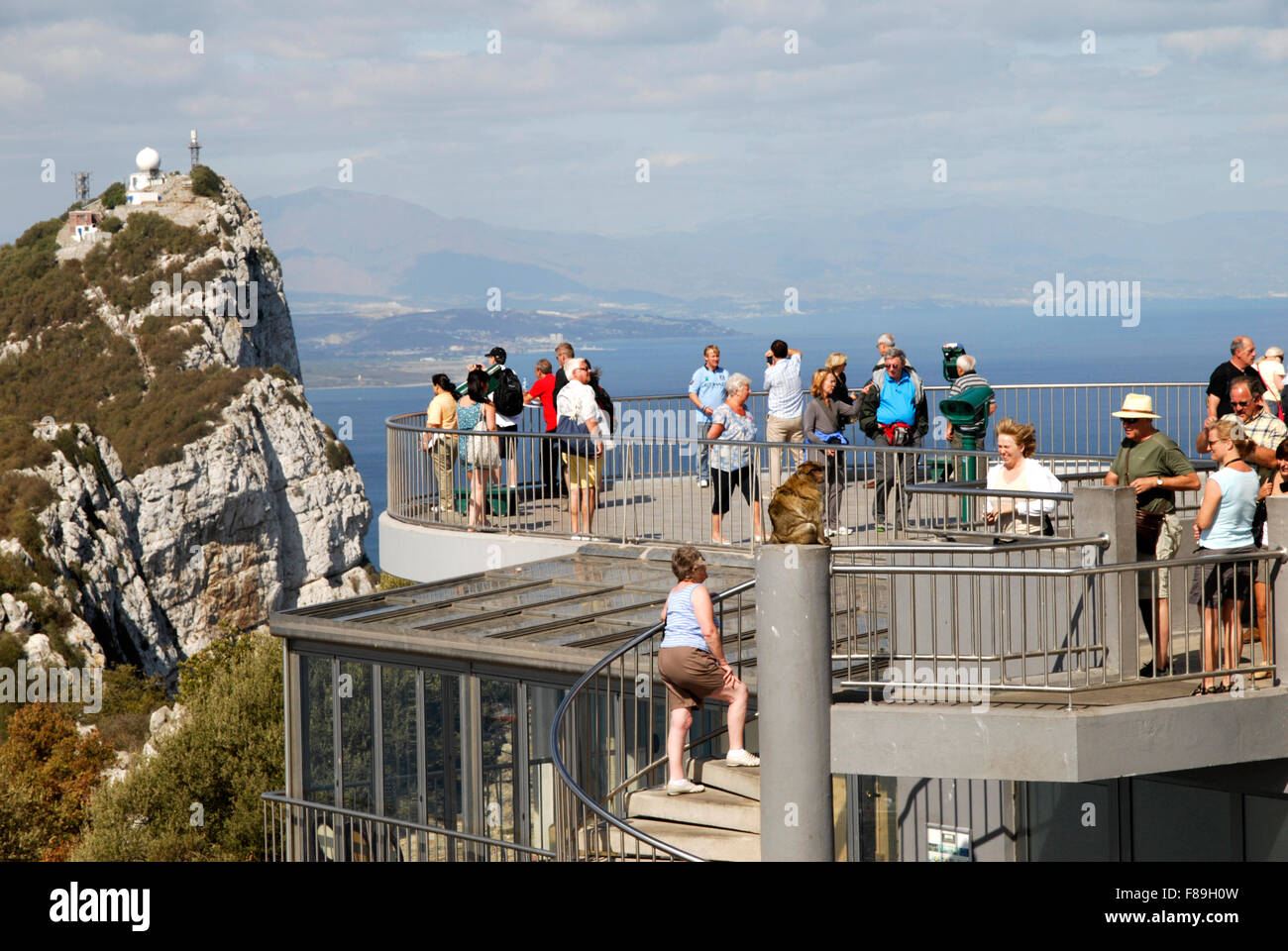 Tourists on the Rock of Gibraltar on the platform above the top station ...