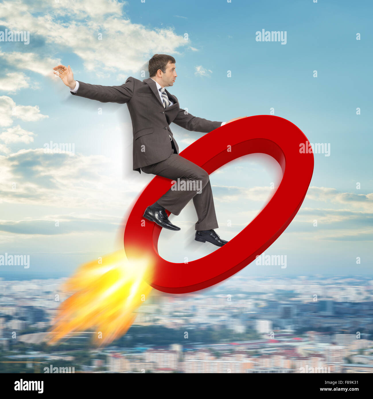 Businessman flying on zero sign Stock Photo - Alamy
