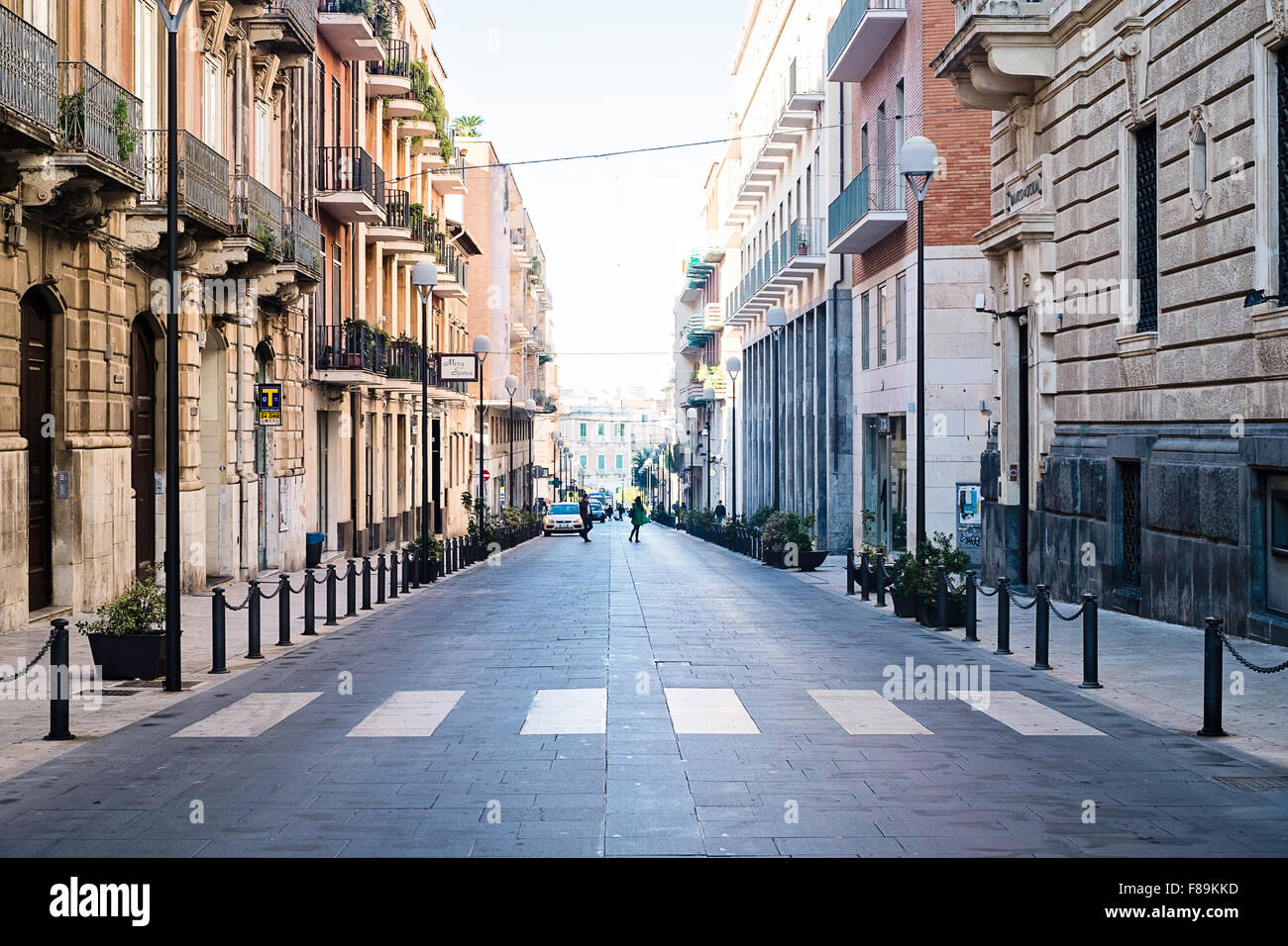 Corso Matteotti, at dusk, street of shops in Ortigia, Syracuse, Sicily ...