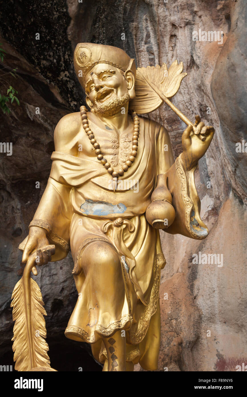 Golden statue of a Chinese god at the Tiger Cave Temple (Wat Tham Seua ...