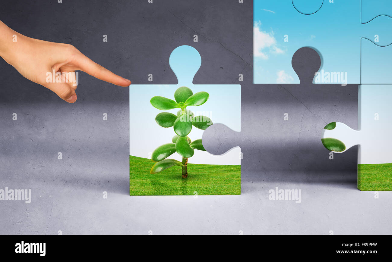 Man pushing puzzle piece hi-res stock photography and images - Alamy