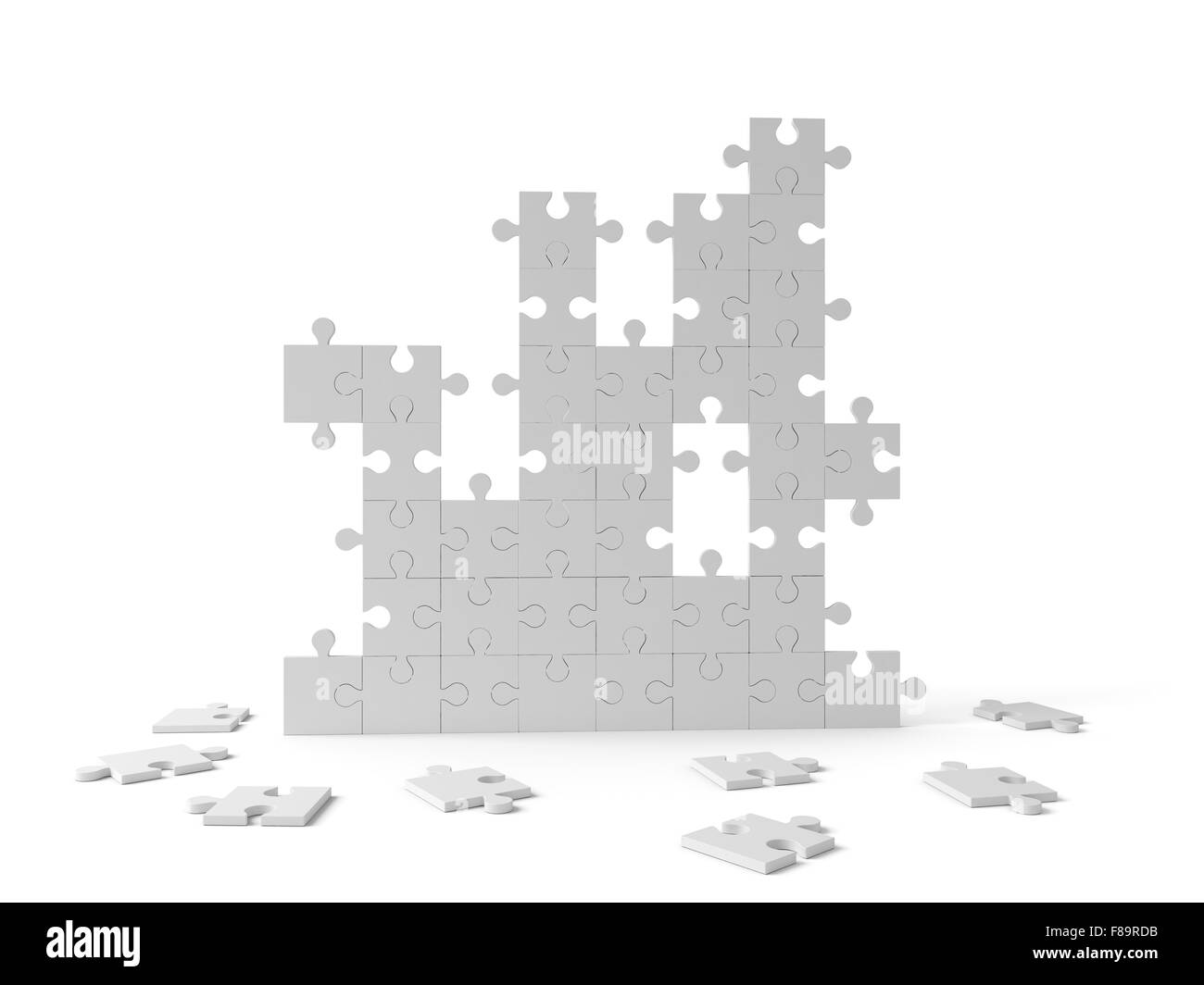 Grey puzzle pieces on white background Stock Photo - Alamy