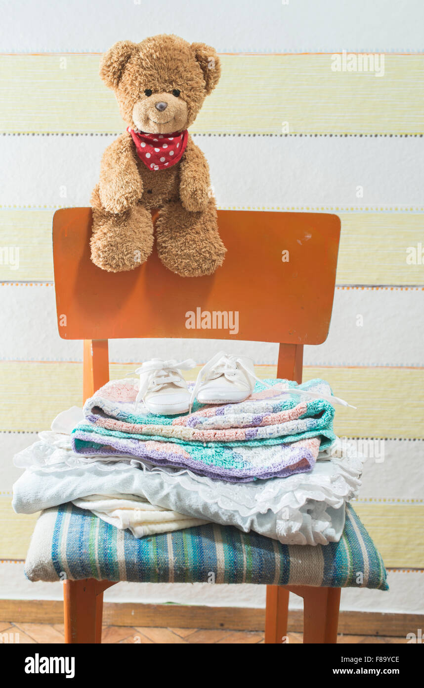 Baby teddy on chair hi-res stock photography and images - Alamy
