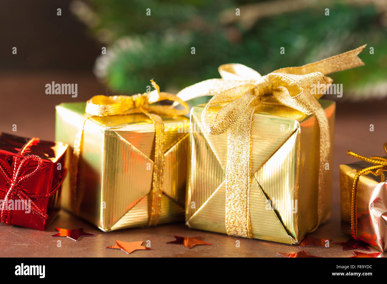 red and golden christmas gift boxes and decoration Stock Photo - Alamy