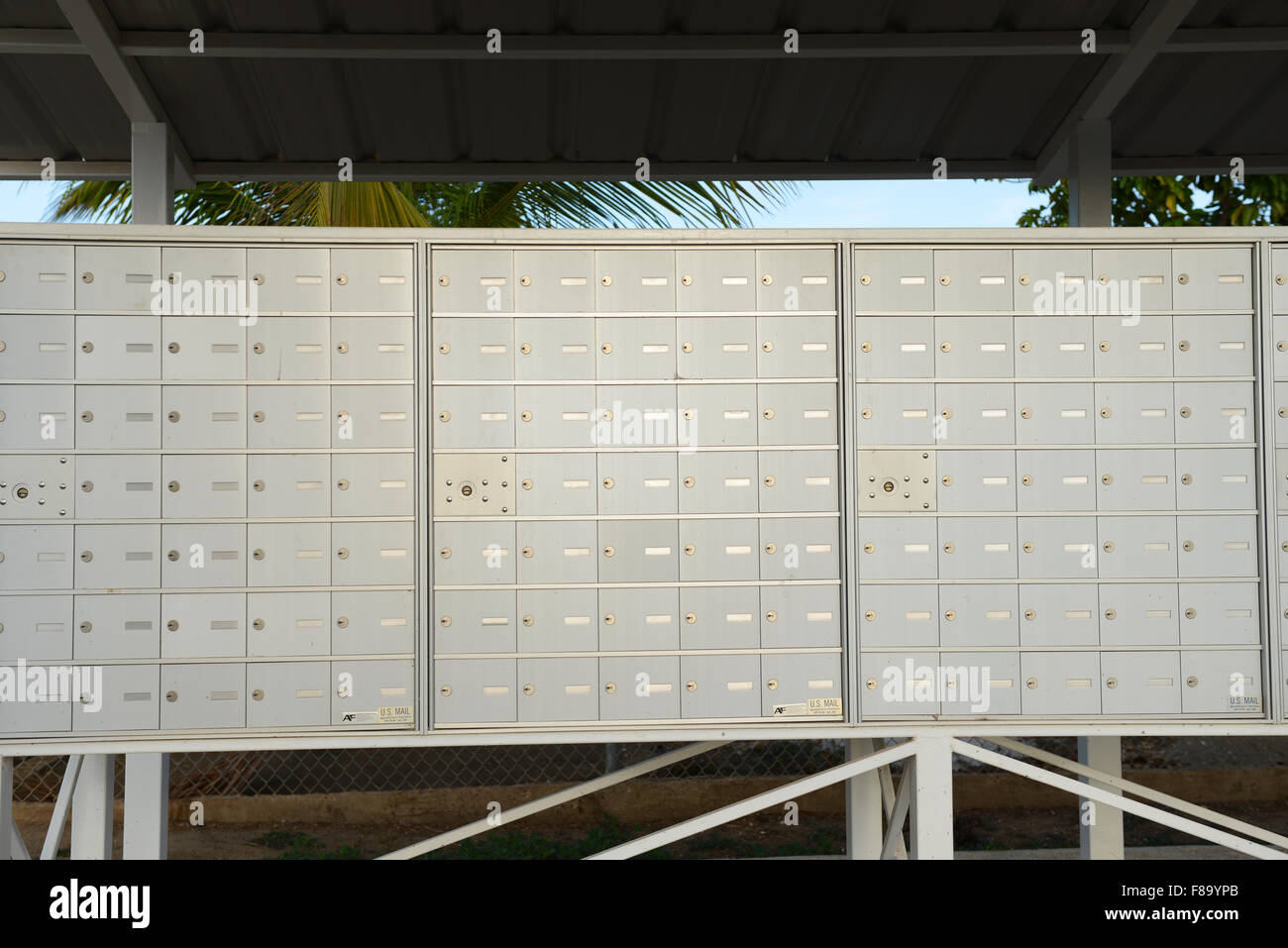Row of mail boxes at a residential development called Urb Ext La' Fe ...