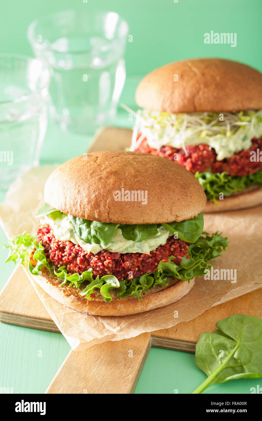 veggie beet and quinoa burger with avocado dressing Stock Photo - Alamy