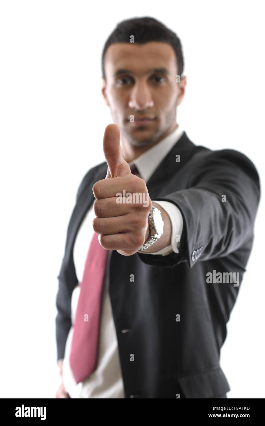 Businessmen making his thumb up saying OK sign symbol isolated on white ...