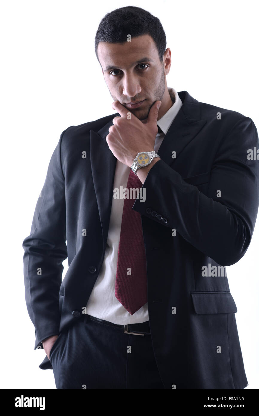 Portrait of a young business man looking depressed from work isolated ...