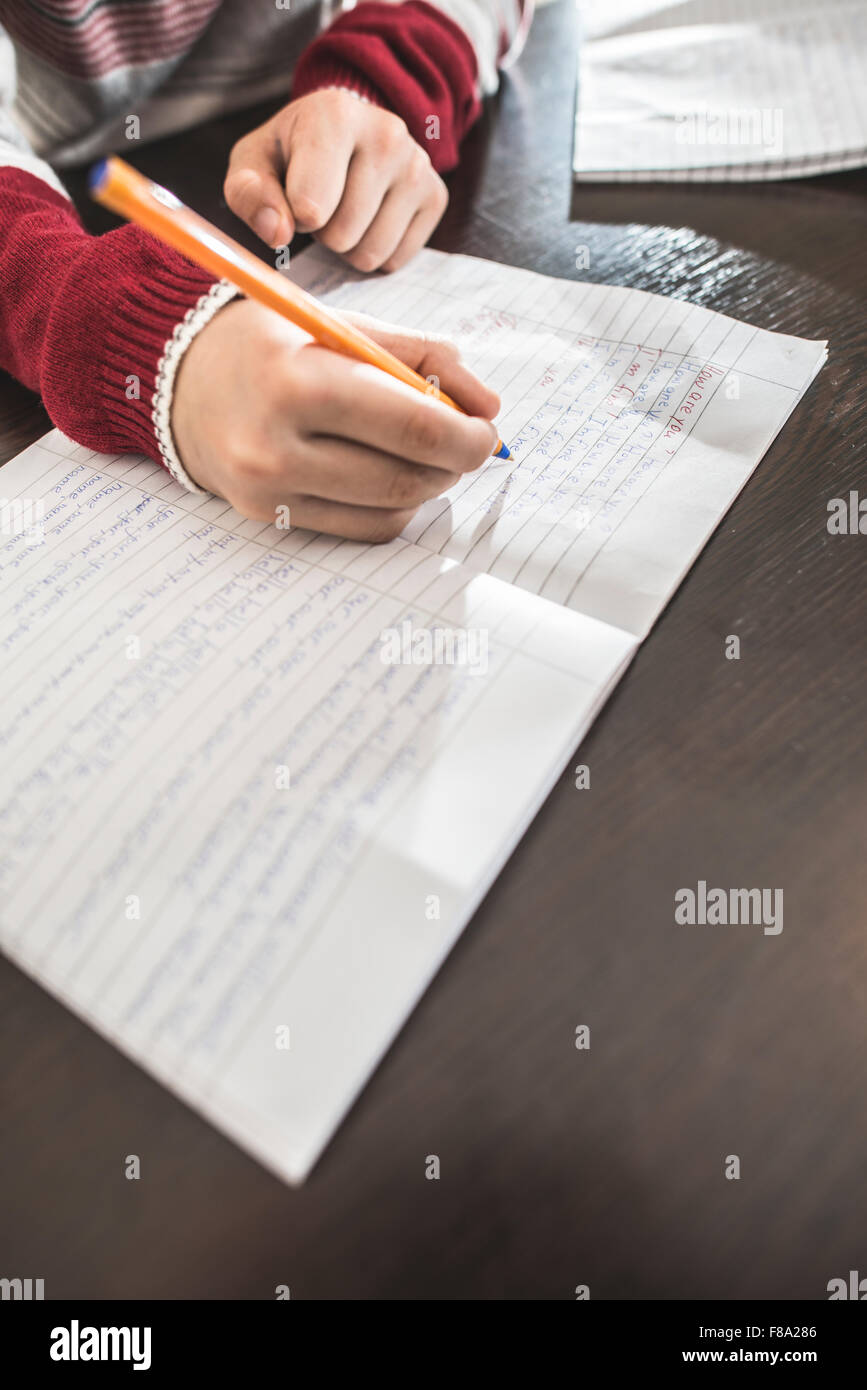 Child writing with pencil hi-res stock photography and images - Alamy