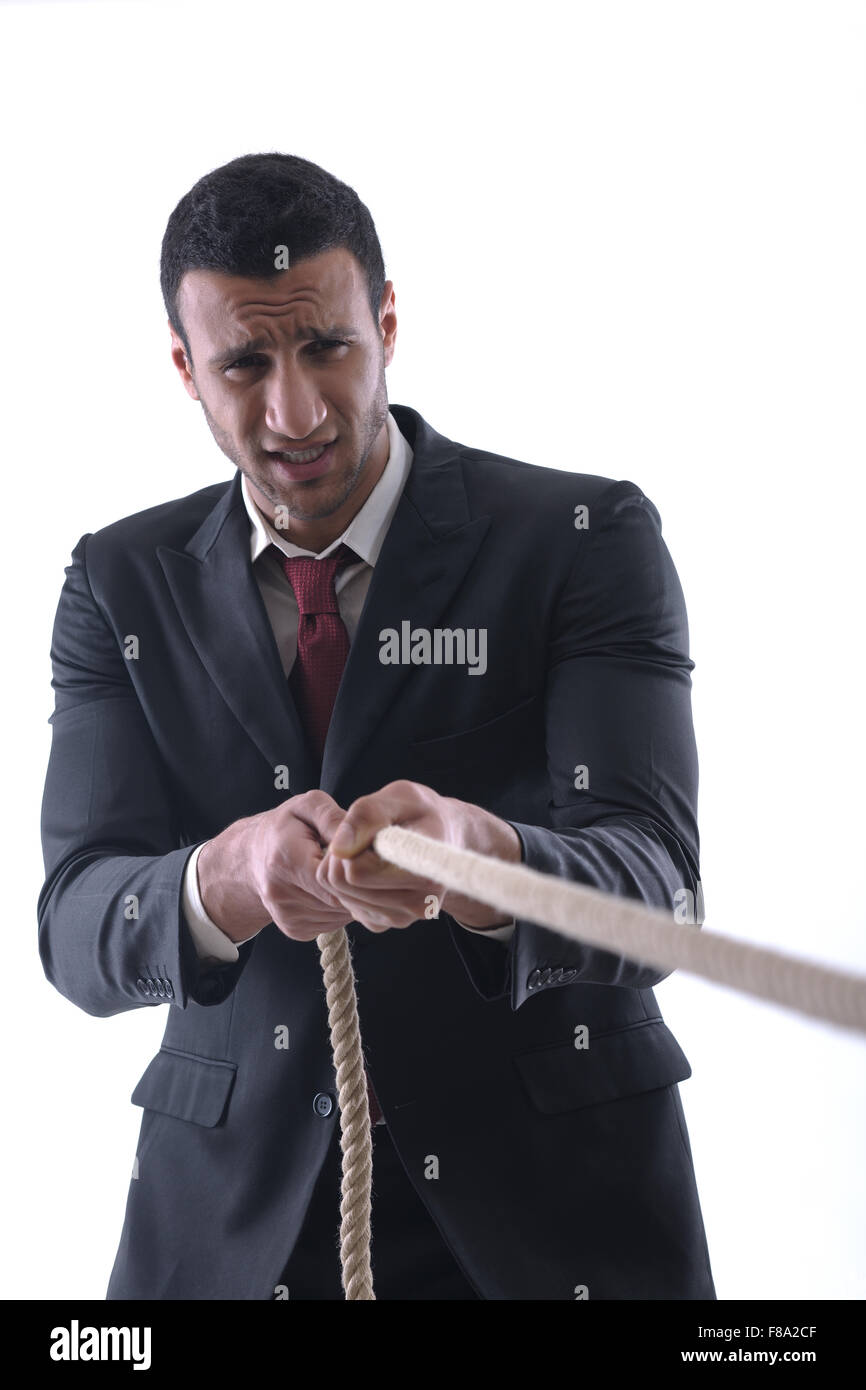 Business man pulling and bond tied with rope concept isolated on white ...