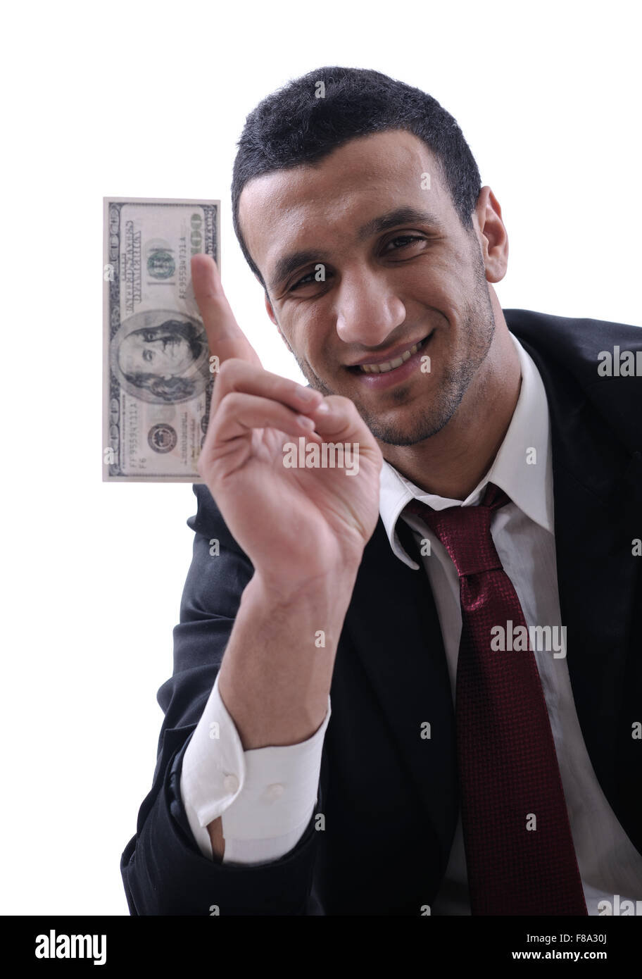 Portrait of a business man holding and catch falling money bills ...