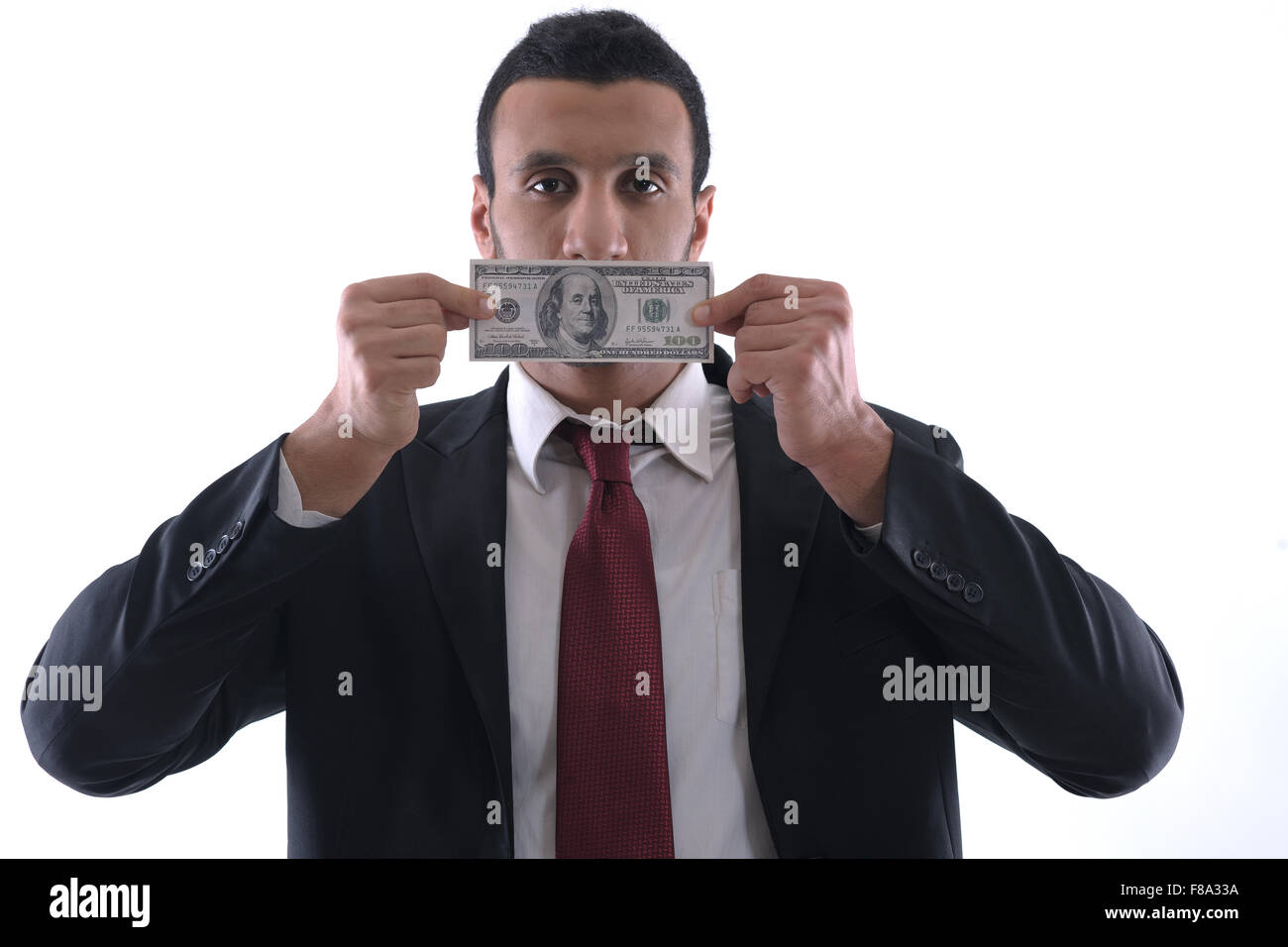 Portrait of a business man holding and catch falling money bills ...