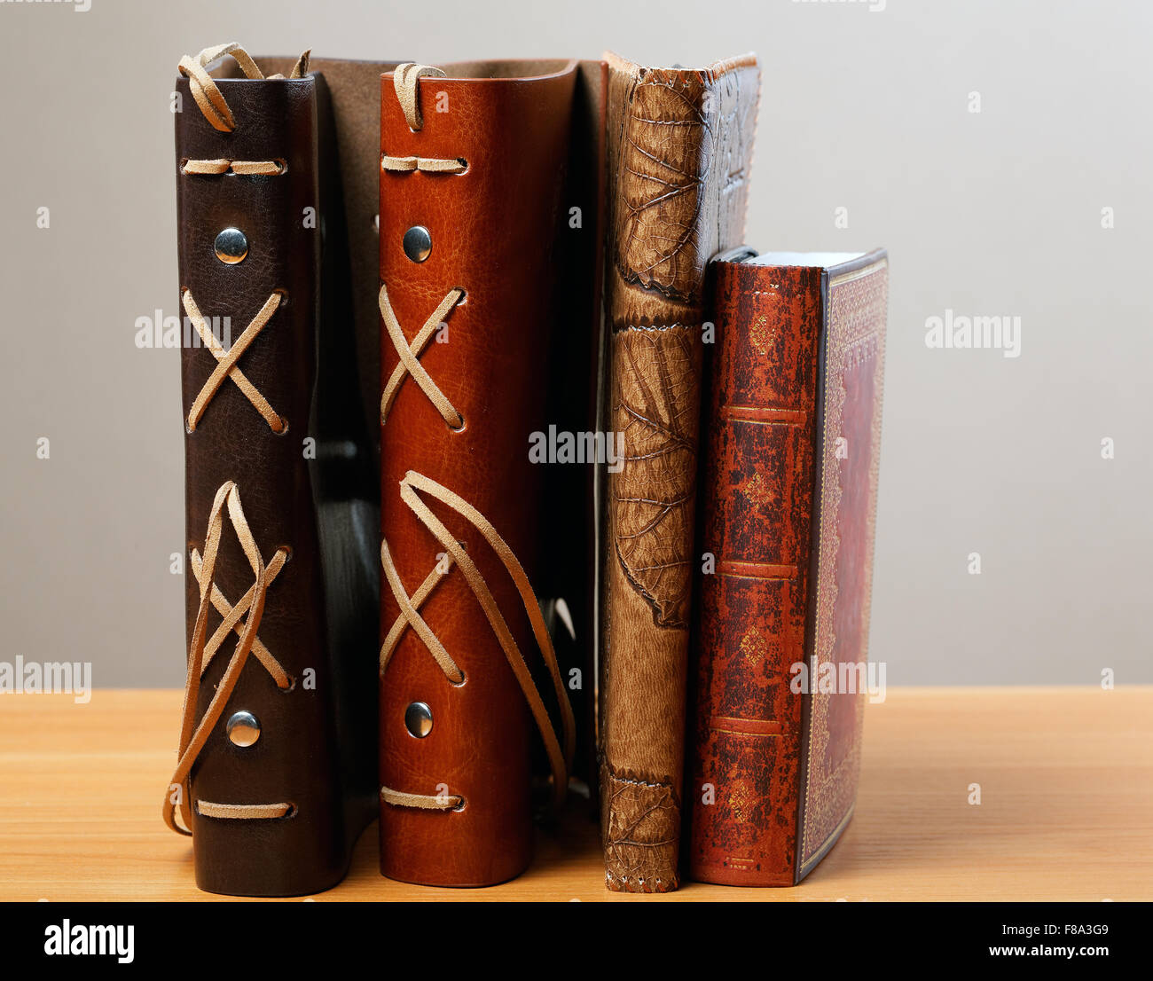 Pile of notebooks in leather covers close up Stock Photo - Alamy