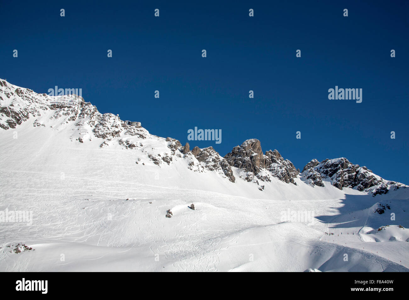 Snow covered cliff faces benneath the summit of Valluga from The ...