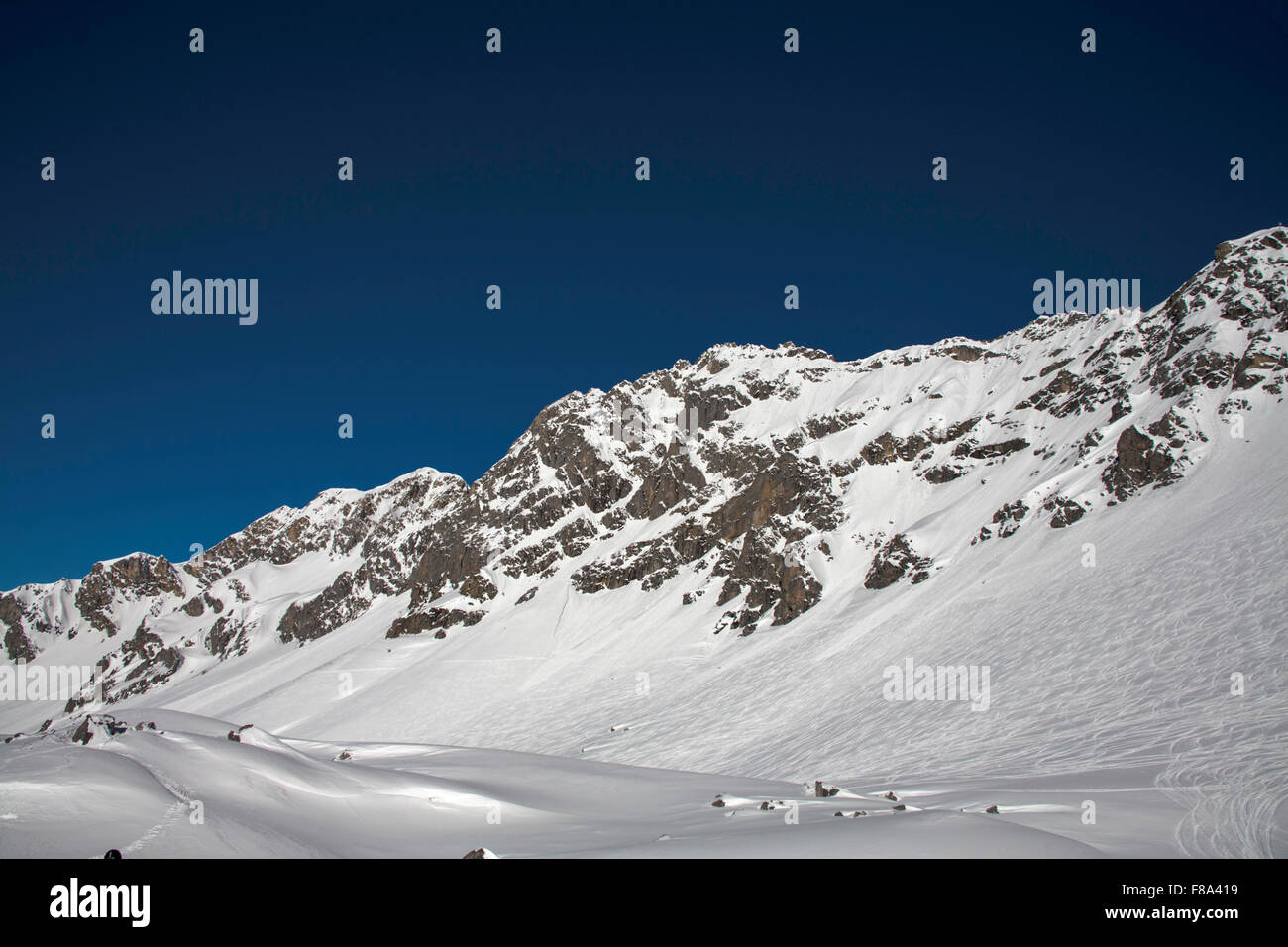 Snow covered cliff faces benneath the summit of Valluga from The ...